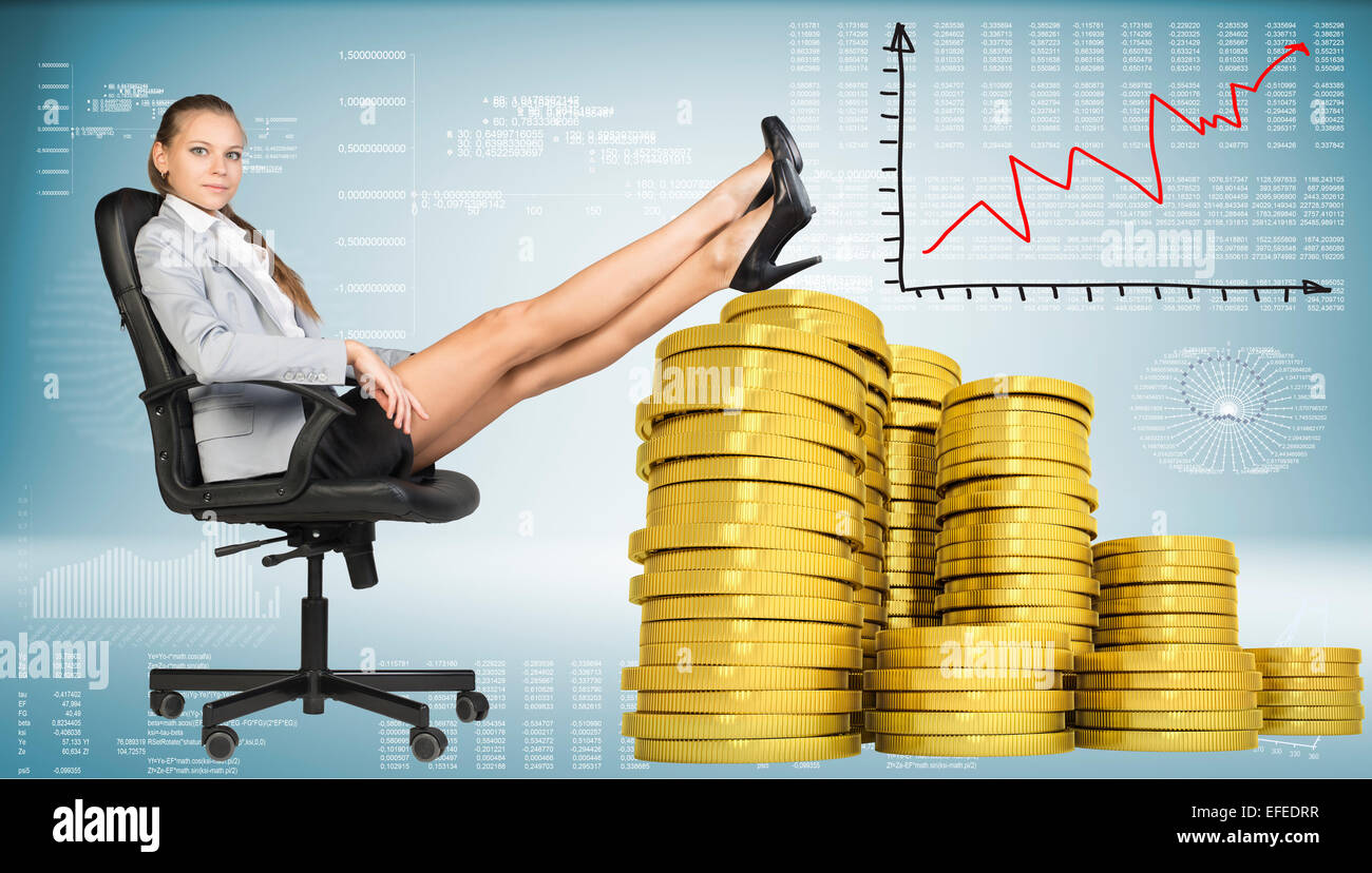 Businesswoman sitting on office chair with golden coins Stock Photo - Alamy