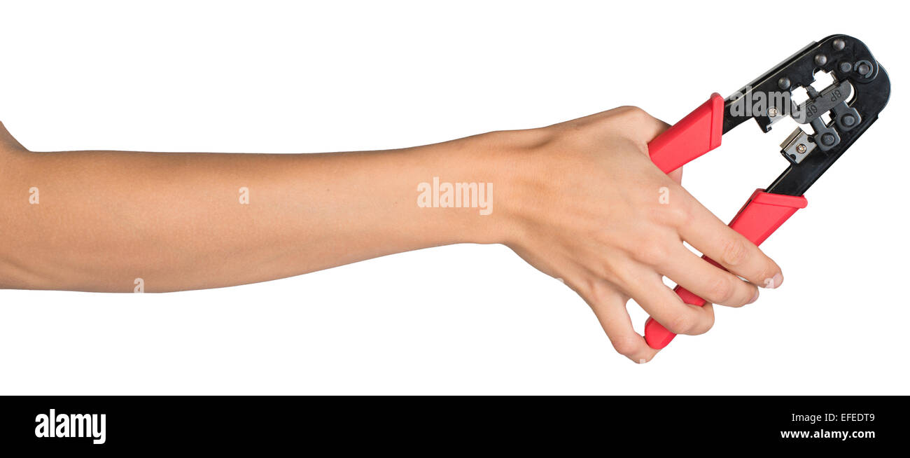 Female hand holding crimping pliers Stock Photo - Alamy