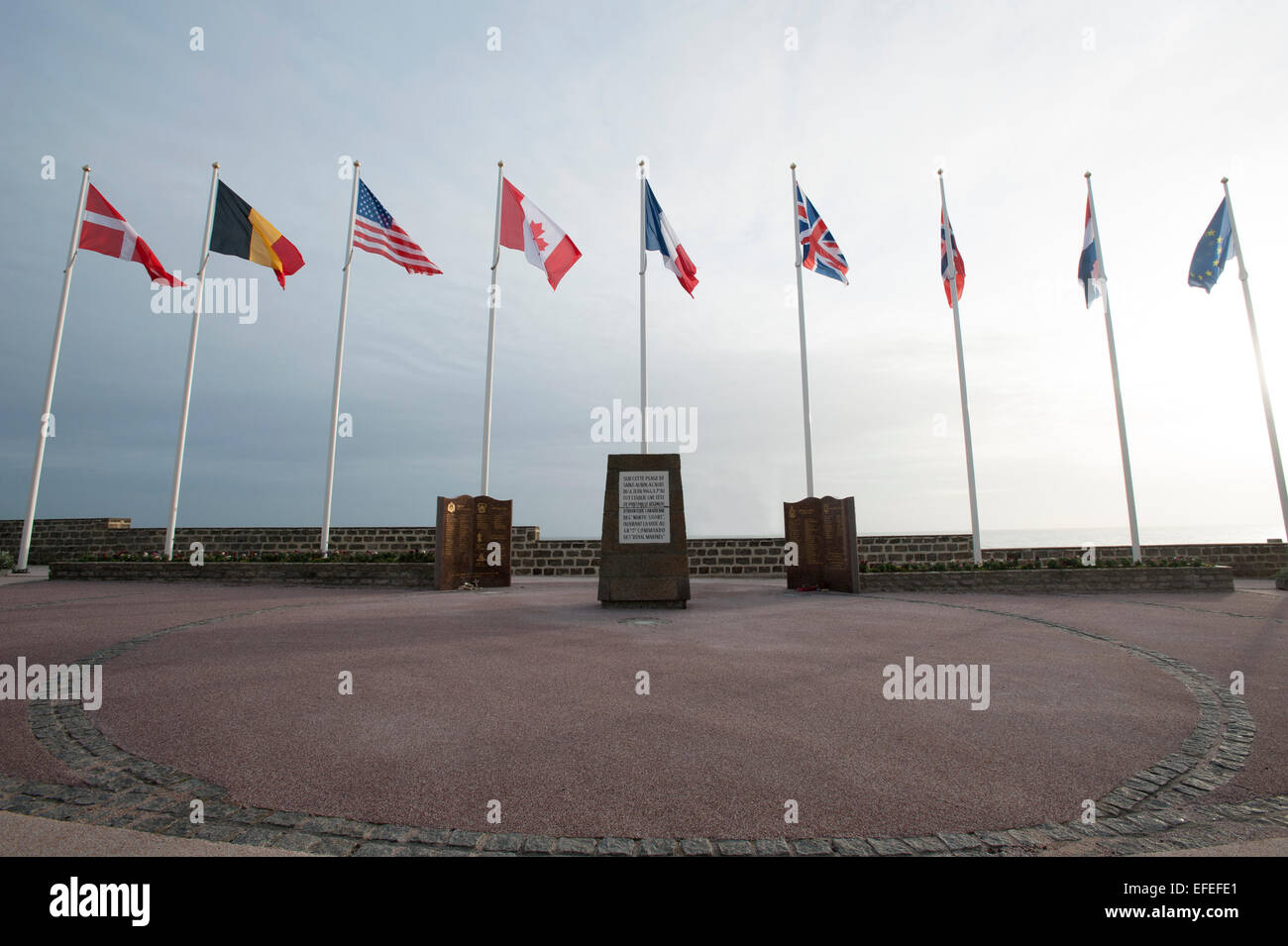 Flags fly at Juno beach, Normandy, a memorial to servicemen who fell at ...
