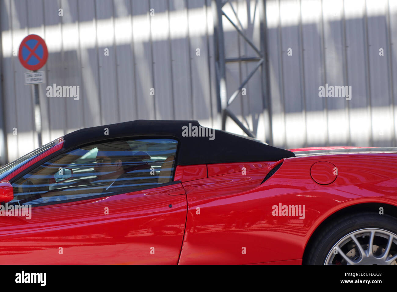 Driver leaving parking, Ferrari F430 spider, Spain Stock Photo - Alamy
