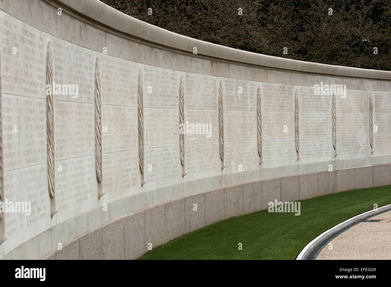 Names of fallen WWII soldiers carved in a long wall at the American ...