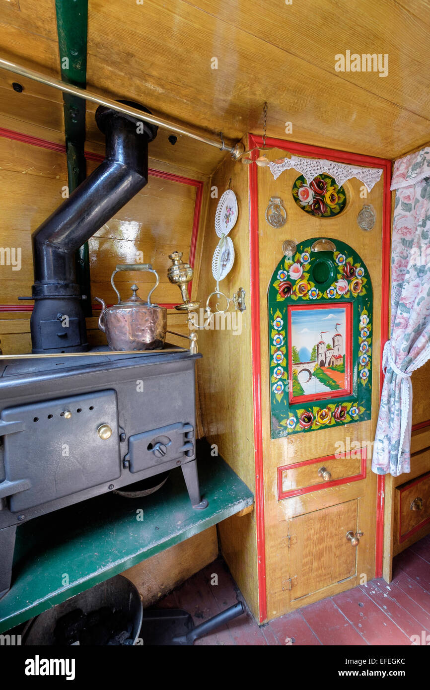 Interior of traditional canal narrowboat kitchen at National Waterways ...