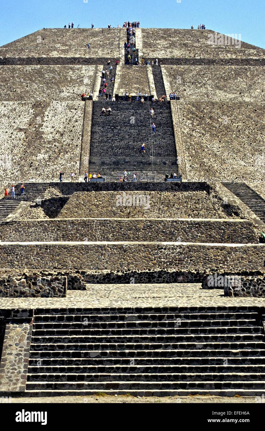 Tourists climb the pyramid of the sun hi-res stock photography and ...