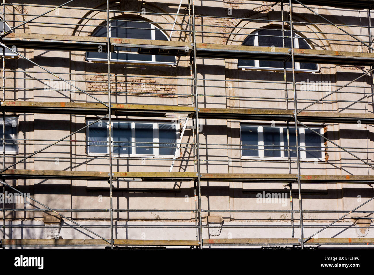scaffolds on an old building being reconstructed Stock Photo - Alamy