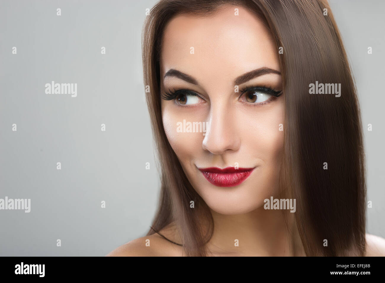 beautiful woman with long straight brown hair Stock Photo - Alamy