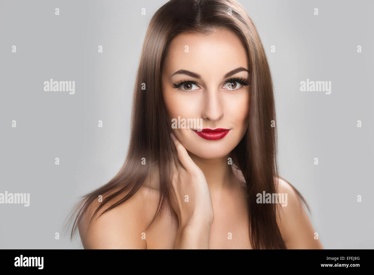 beautiful woman with long straight brown hair Stock Photo - Alamy