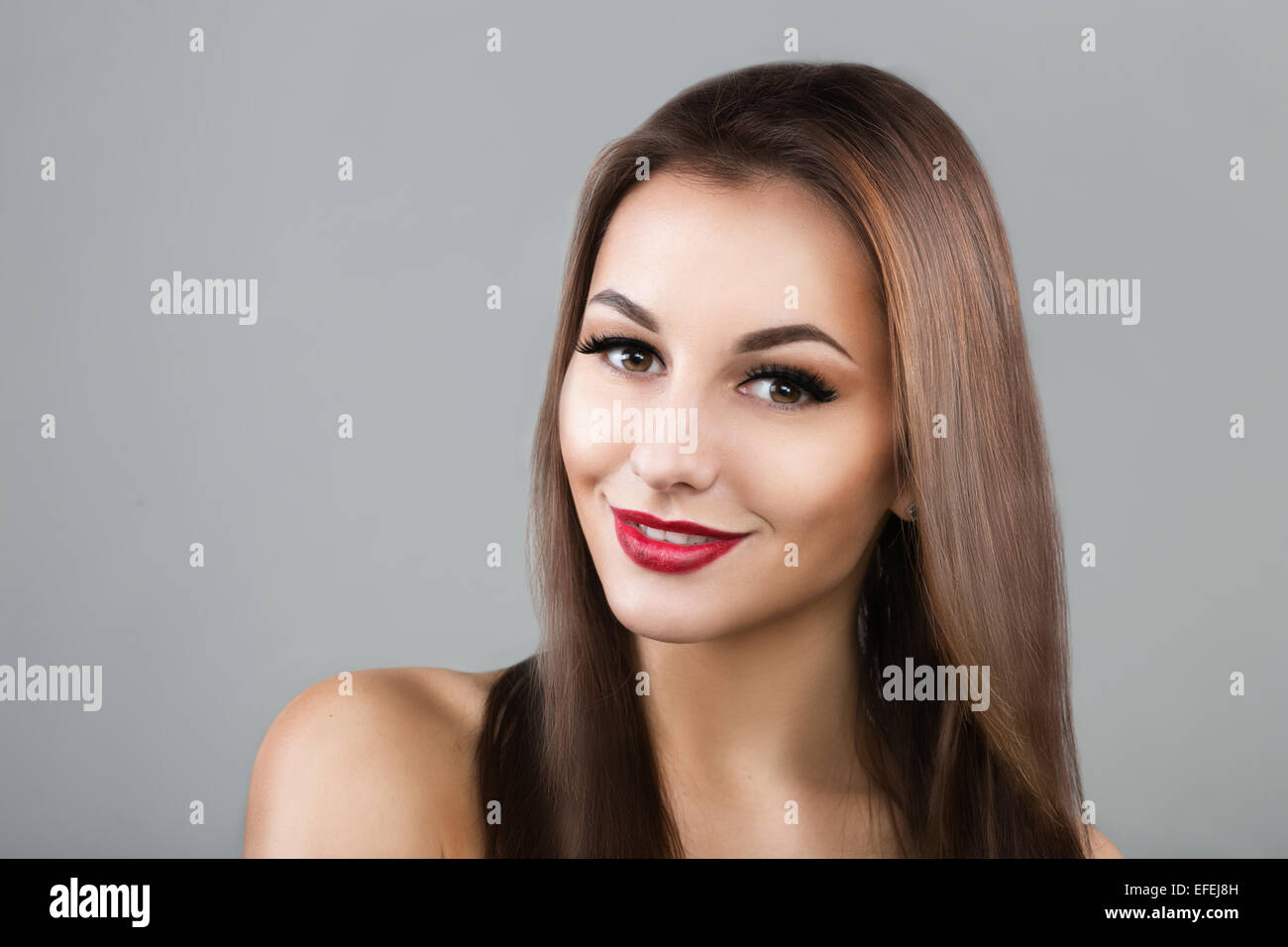 beautiful woman with long straight brown hair Stock Photo - Alamy