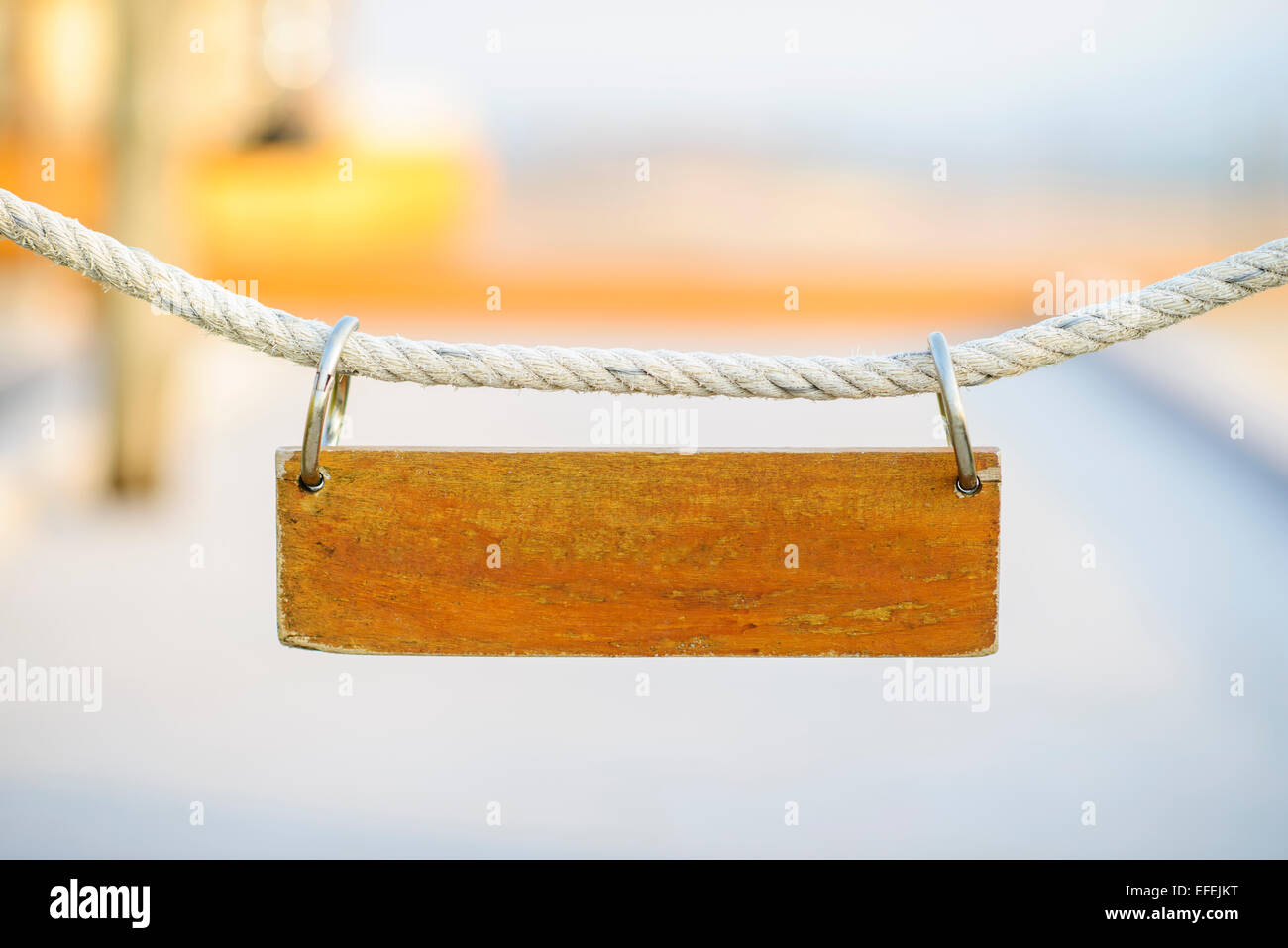 Hanging wood sign hi-res stock photography and images - Alamy