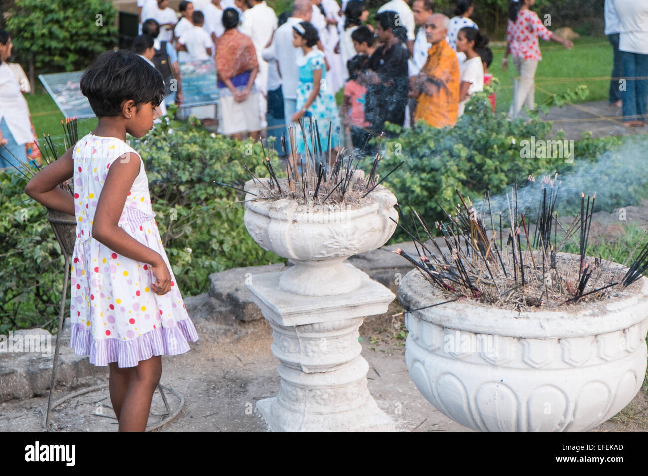 Incense offering by pilgrims devotees at Temple of the Sacred Tooth ...