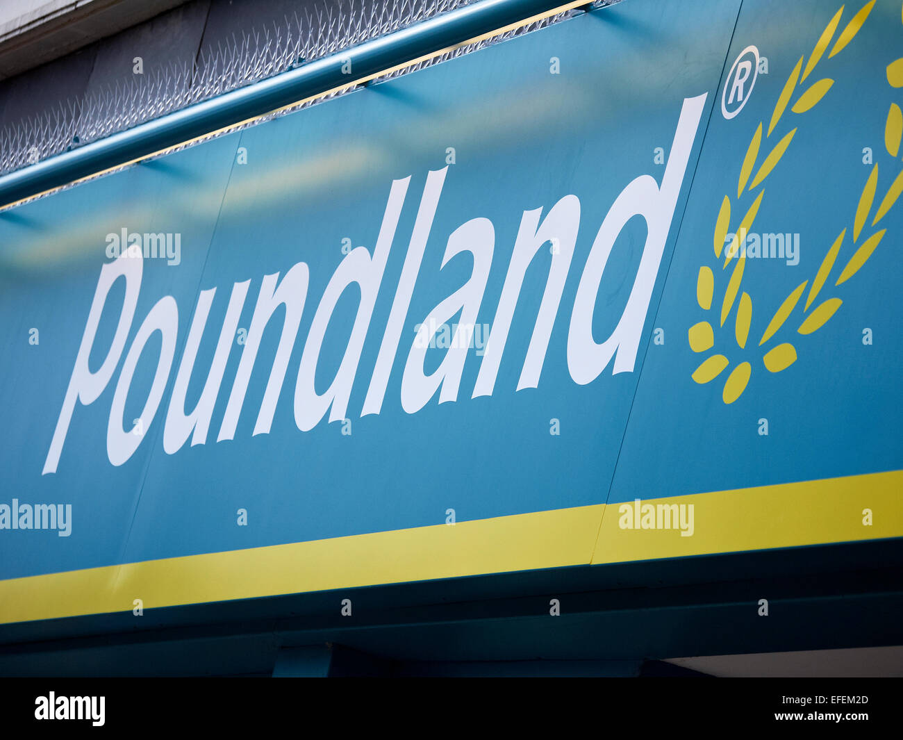 Poundland sign on outside wall UK Stock Photo - Alamy