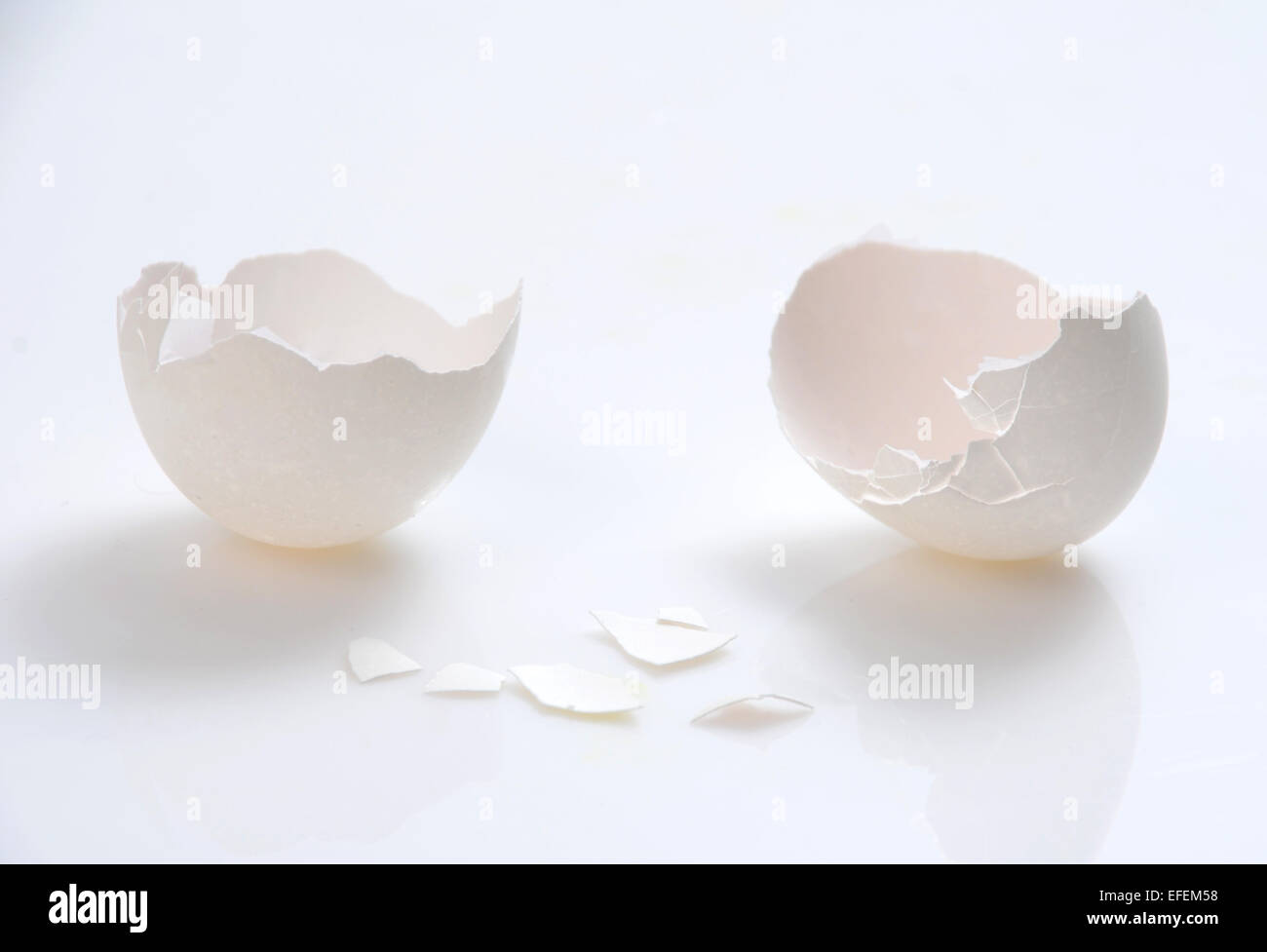 Egg shell on white background Stock Photo - Alamy