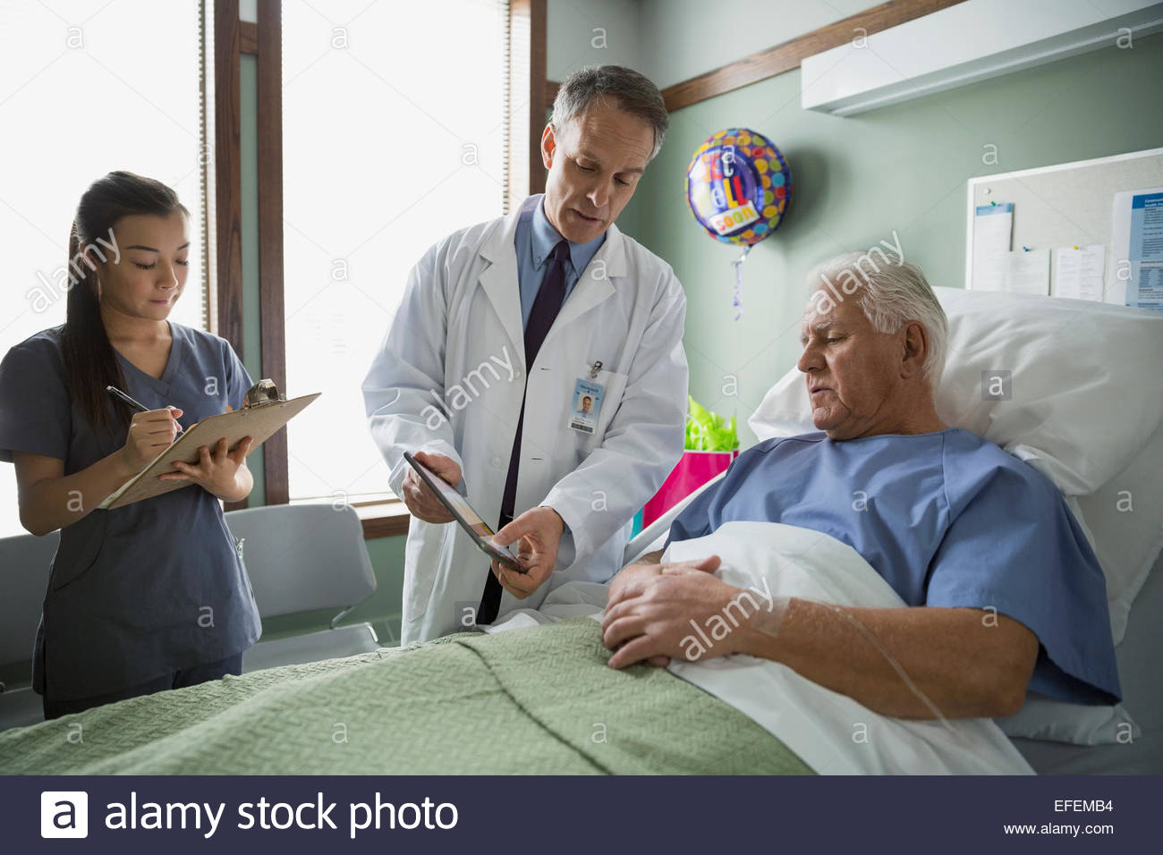Doctor tablet patient hospital hi-res stock photography and images - Alamy