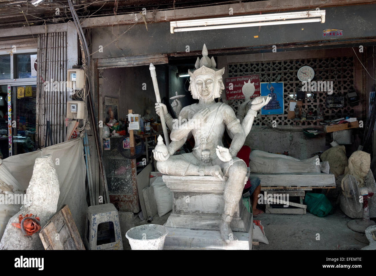 Unfinished statue of Brahma at a workshop at the amulet market in ...