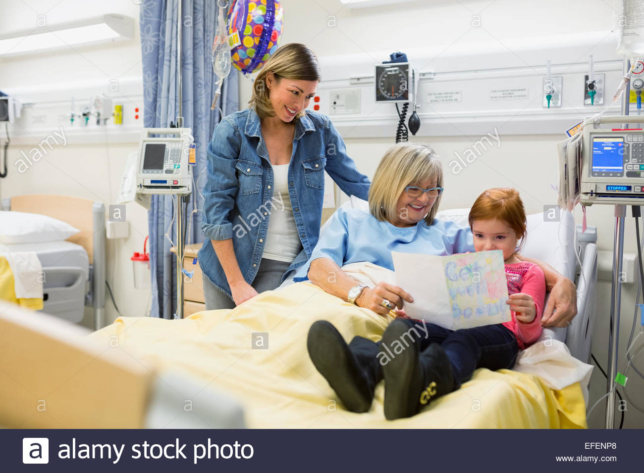 Daughter and granddaughter visit grandmother hi-res stock photography ...