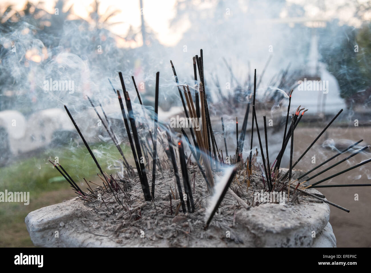Incense offering by pilgrims devotees at Temple of the Sacred Tooth ...