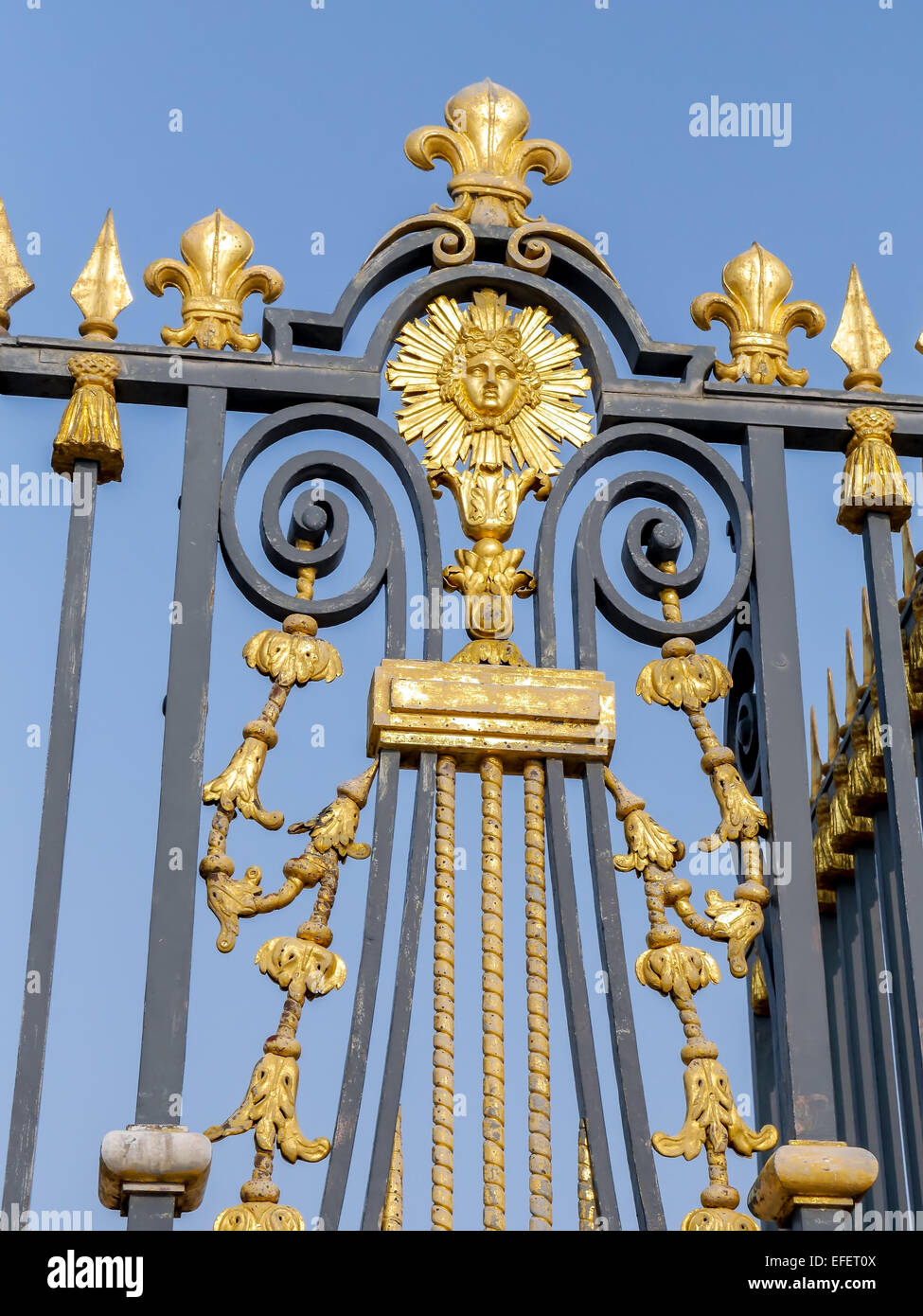 Front fence of Versailles Palace with golden ornaments, France Stock ...