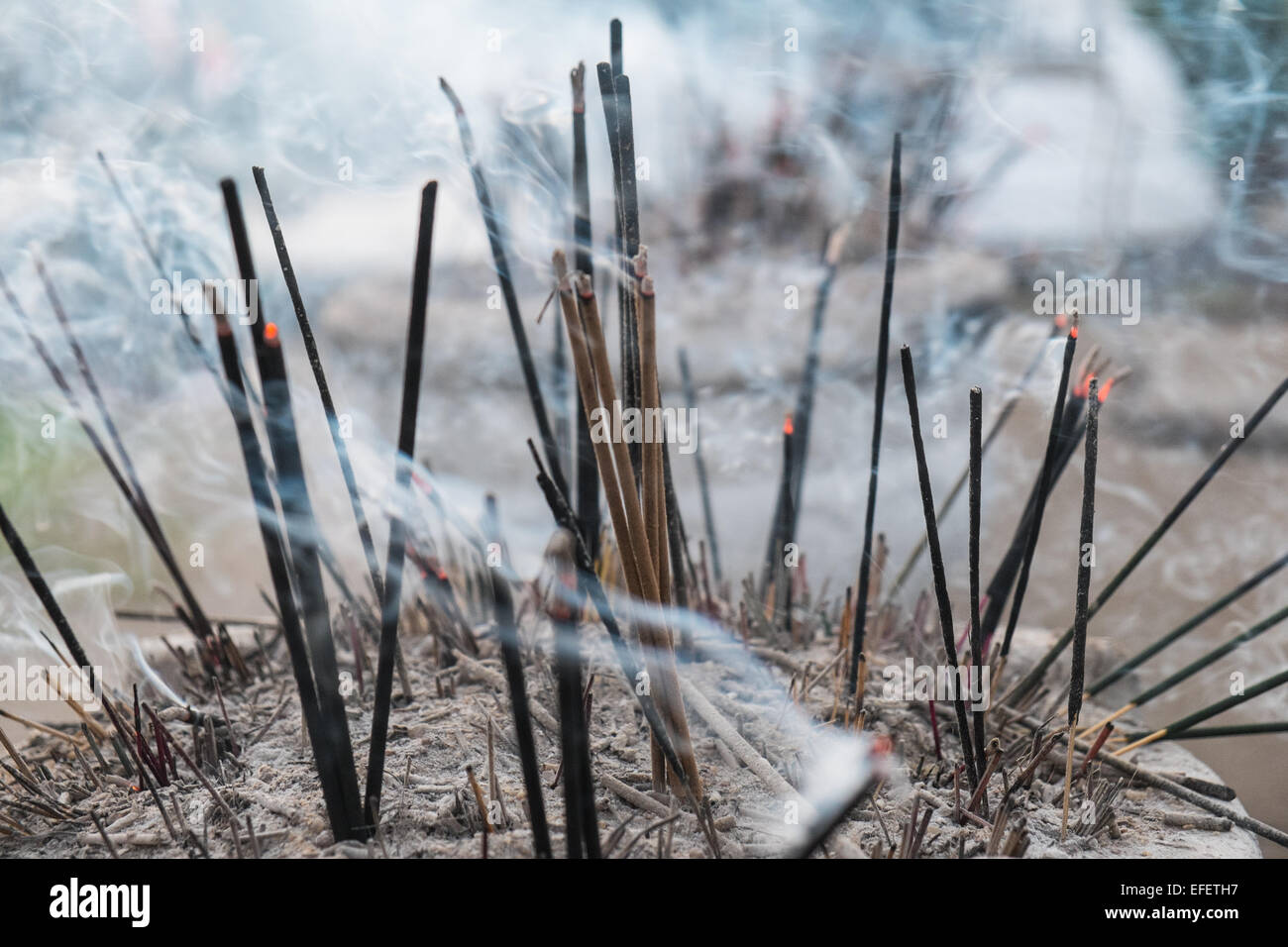 Incense offering by pilgrims devotees at Temple of the Sacred Tooth ...