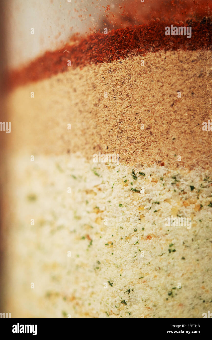 Seasonings with different colors and textures in a bottle Stock Photo ...