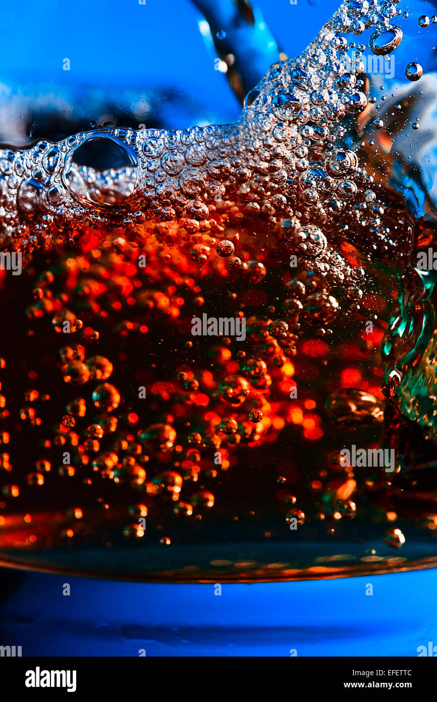 detail of an alcoholic beverage on yellow background Stock Photo - Alamy
