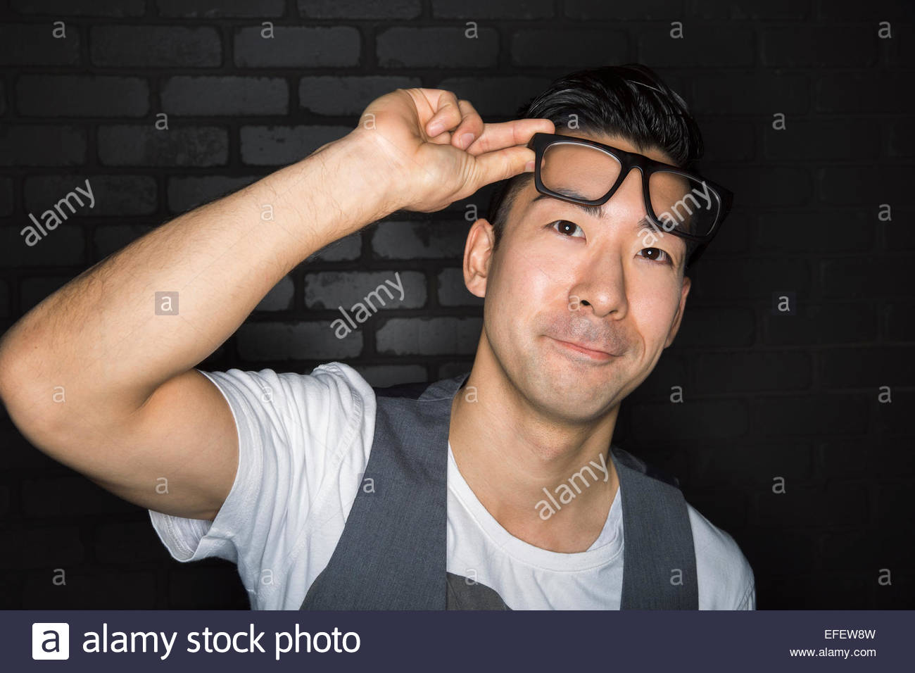 Raised eyeglasses hi-res stock photography and images - Alamy