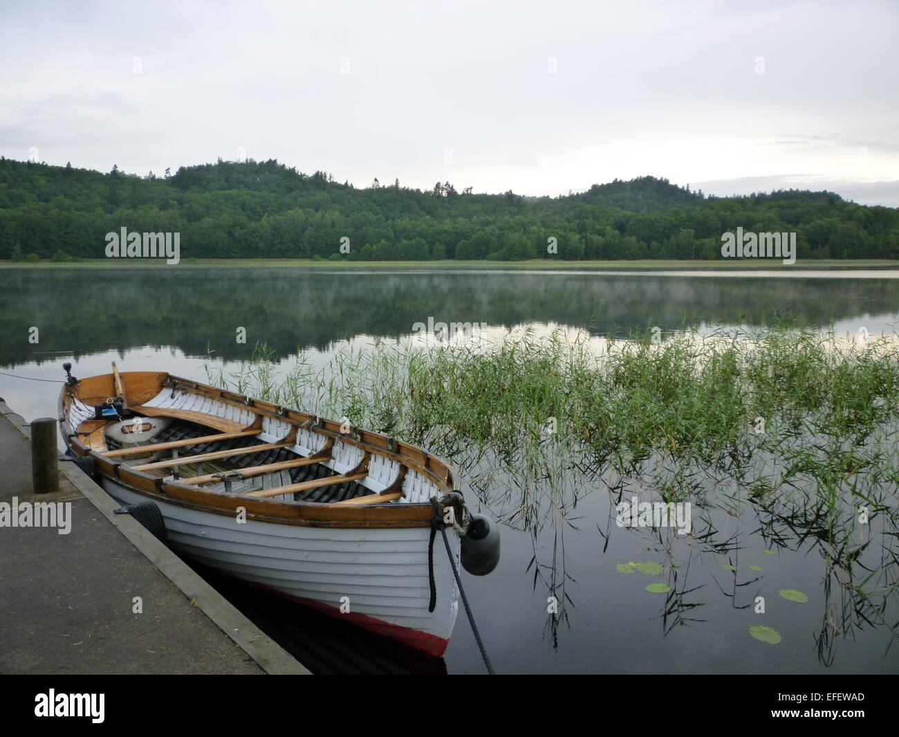 Rowboat on Lake Stock Photo - Alamy