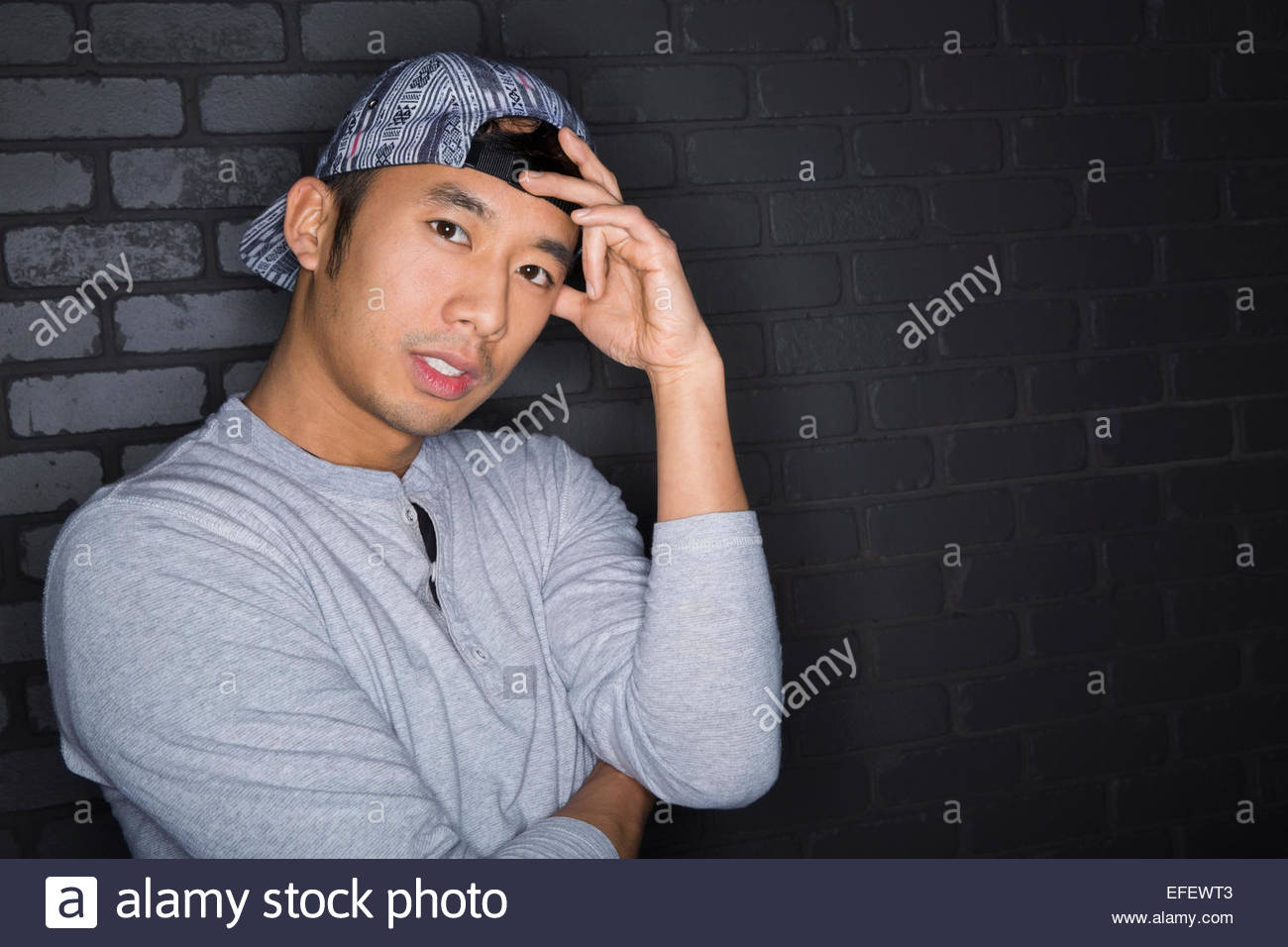 Backward adult hi-res stock photography and images - Alamy