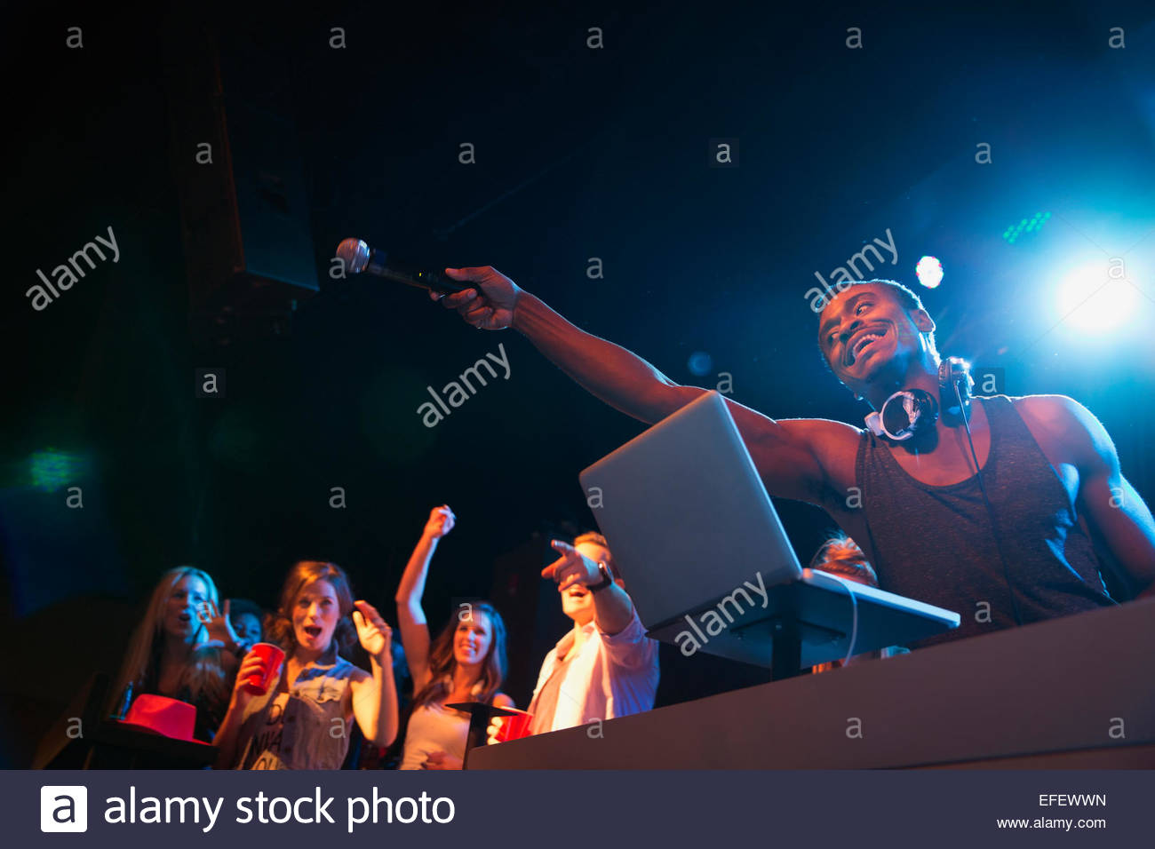 Woman microphone smiling stage hi-res stock photography and images - Alamy