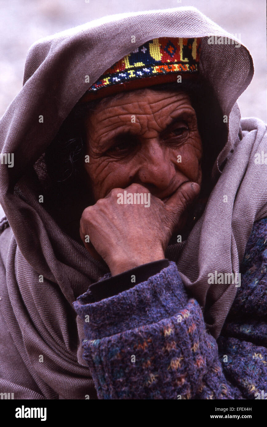Shimshali old lady pausing for tea break in Pakistan Stock Photo - Alamy