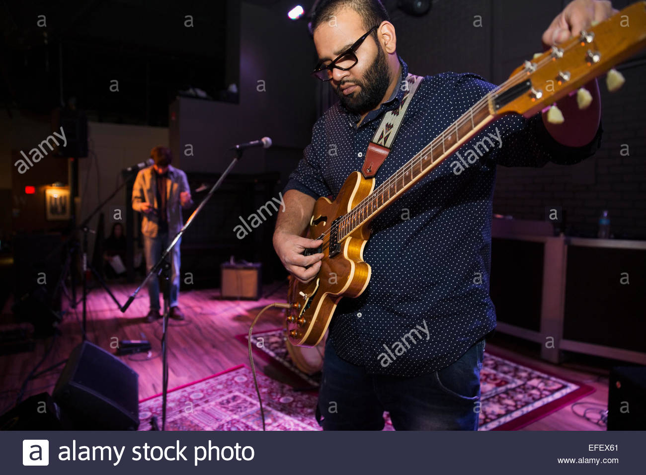 and guitar on stage hi-res stock photography and images - Alamy