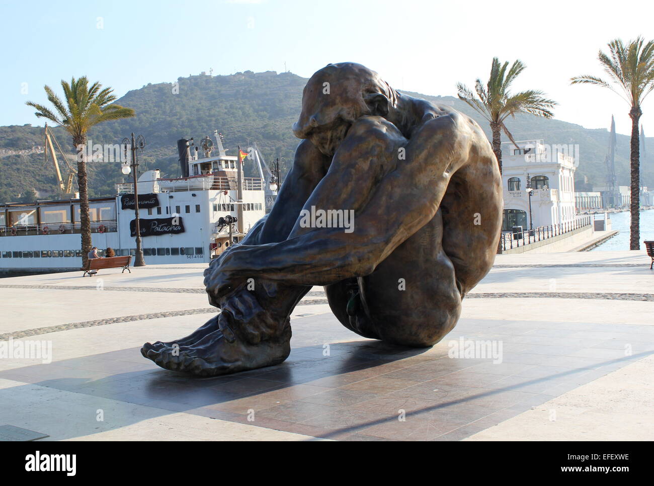 Five meter high El Zulo statue by artist Víctor Ochoa in the harbour of ...