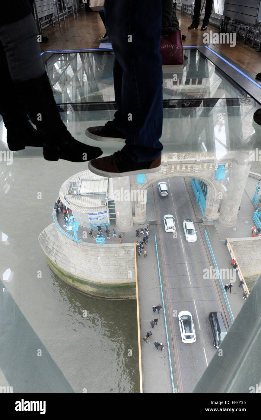 Visitors on the new glass floor in Tower Bridge. One of the bridge’s ...