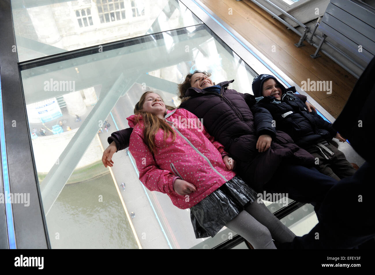 Visitors on the new glass floor in Tower Bridge. One of the bridge’s ...