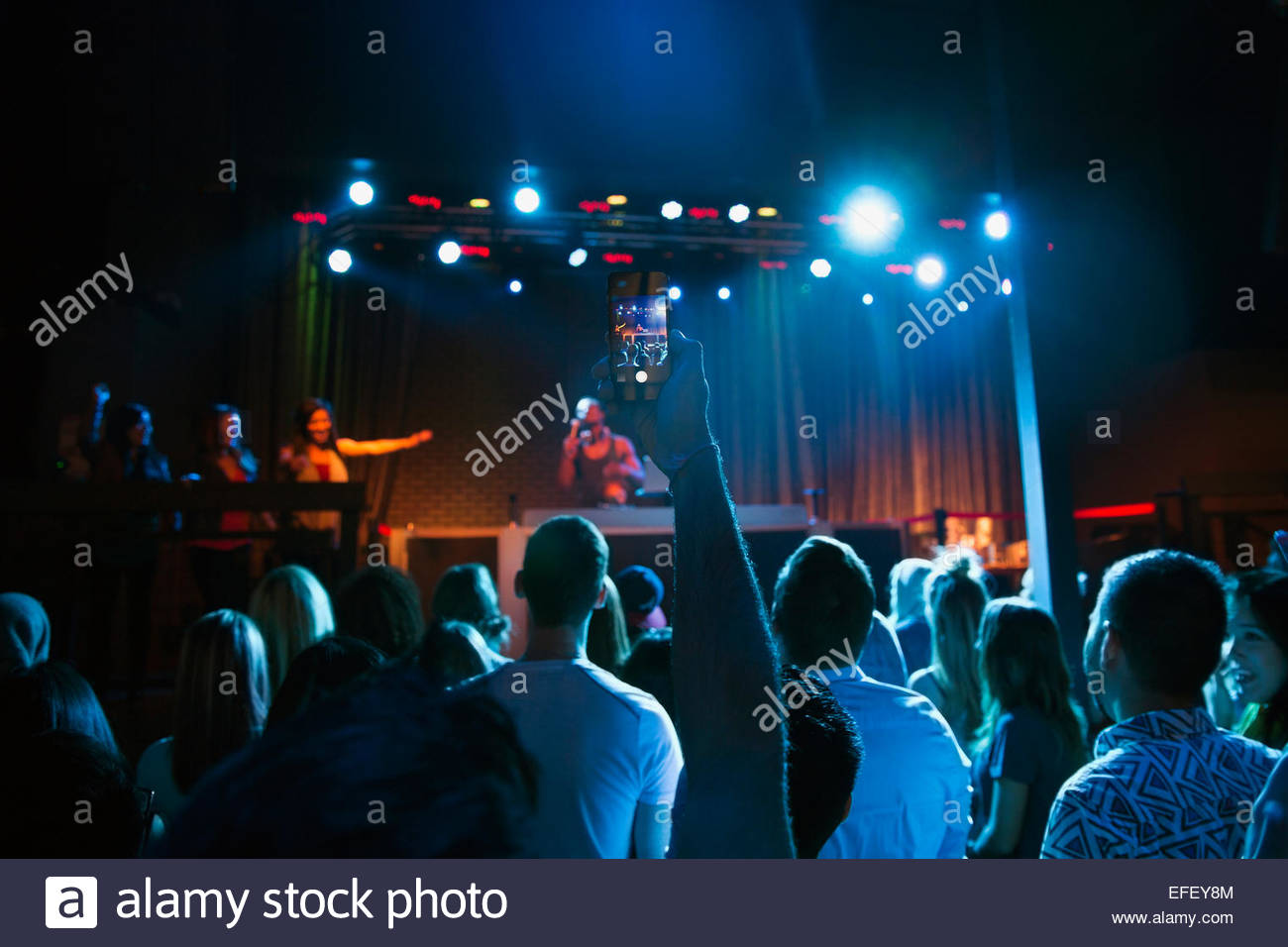 Large crowd of people standing watching hi-res stock photography and ...