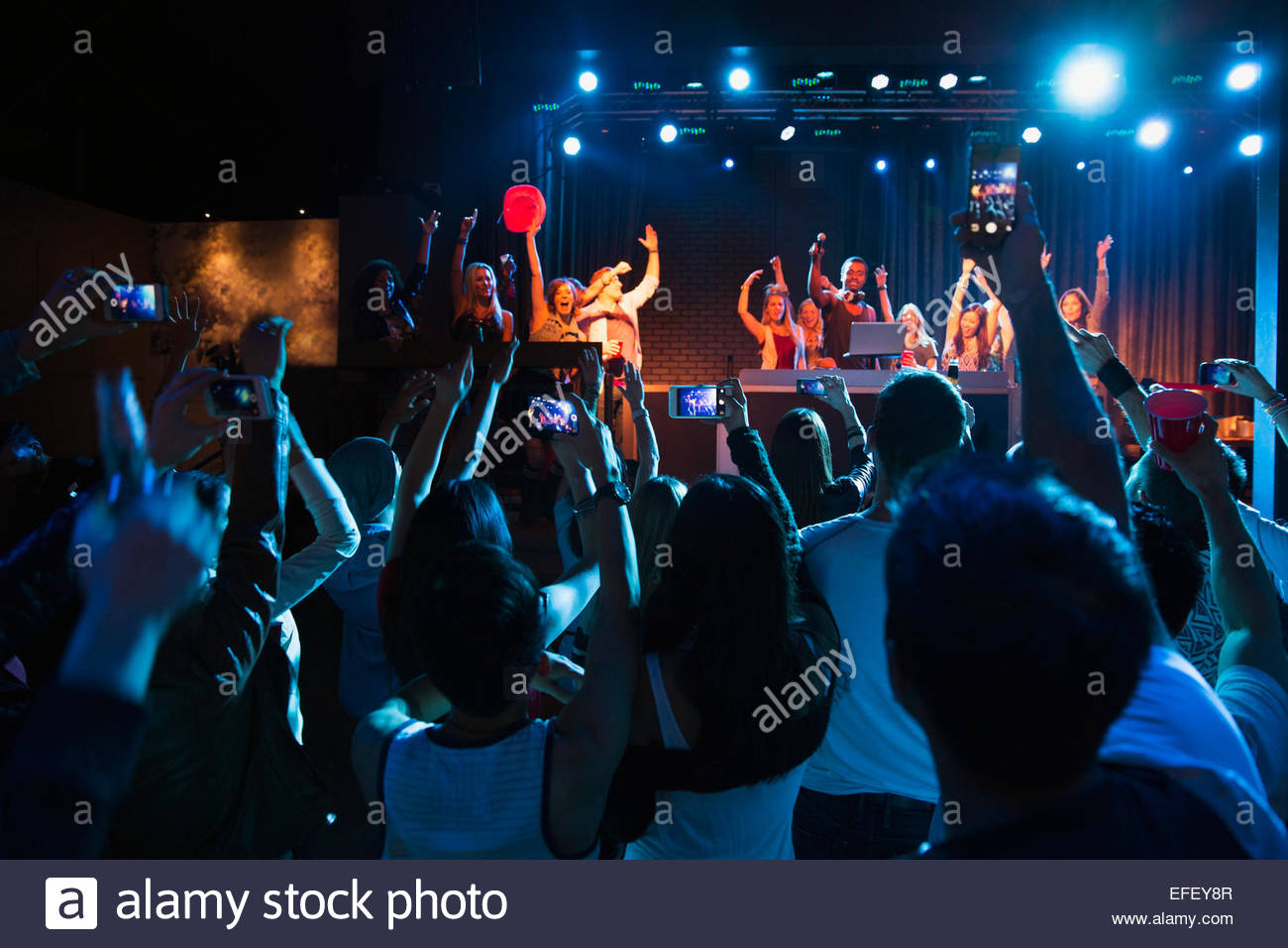 Crowd cheering dj on stage hi-res stock photography and images - Alamy