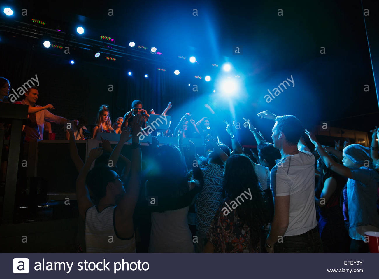 Crowd cheering dj on stage hi-res stock photography and images - Alamy