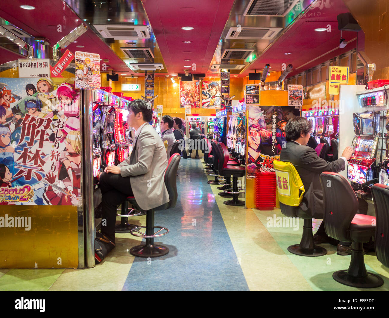 Man playing pachinko in a Tokyo game house Stock Photo - Alamy