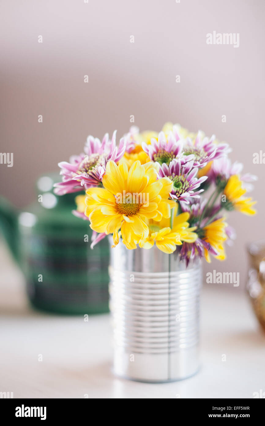 Small can with wild flowers Stock Photo - Alamy