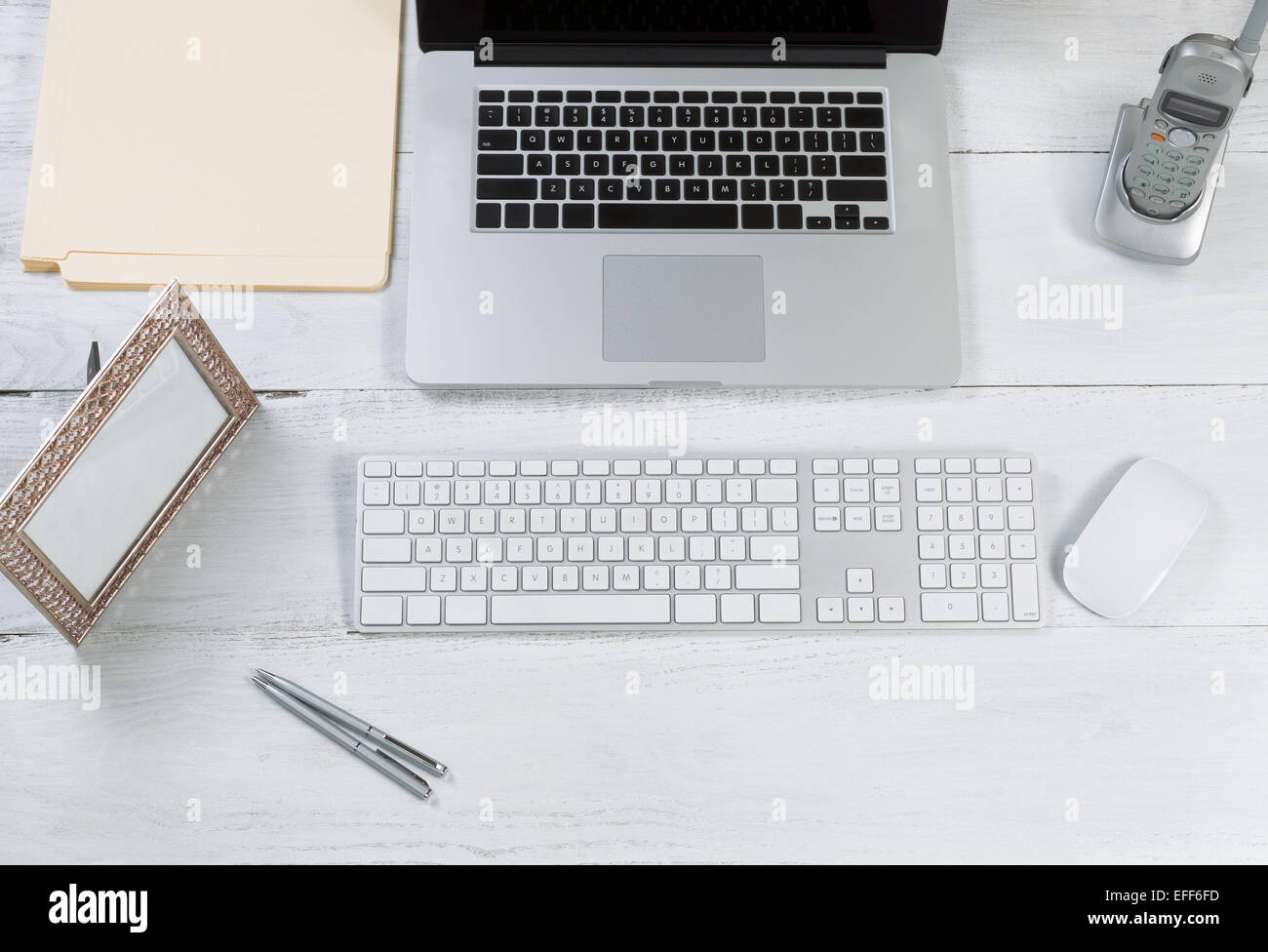 Top view angle of desktop layout for proper use consisting of laptop ...