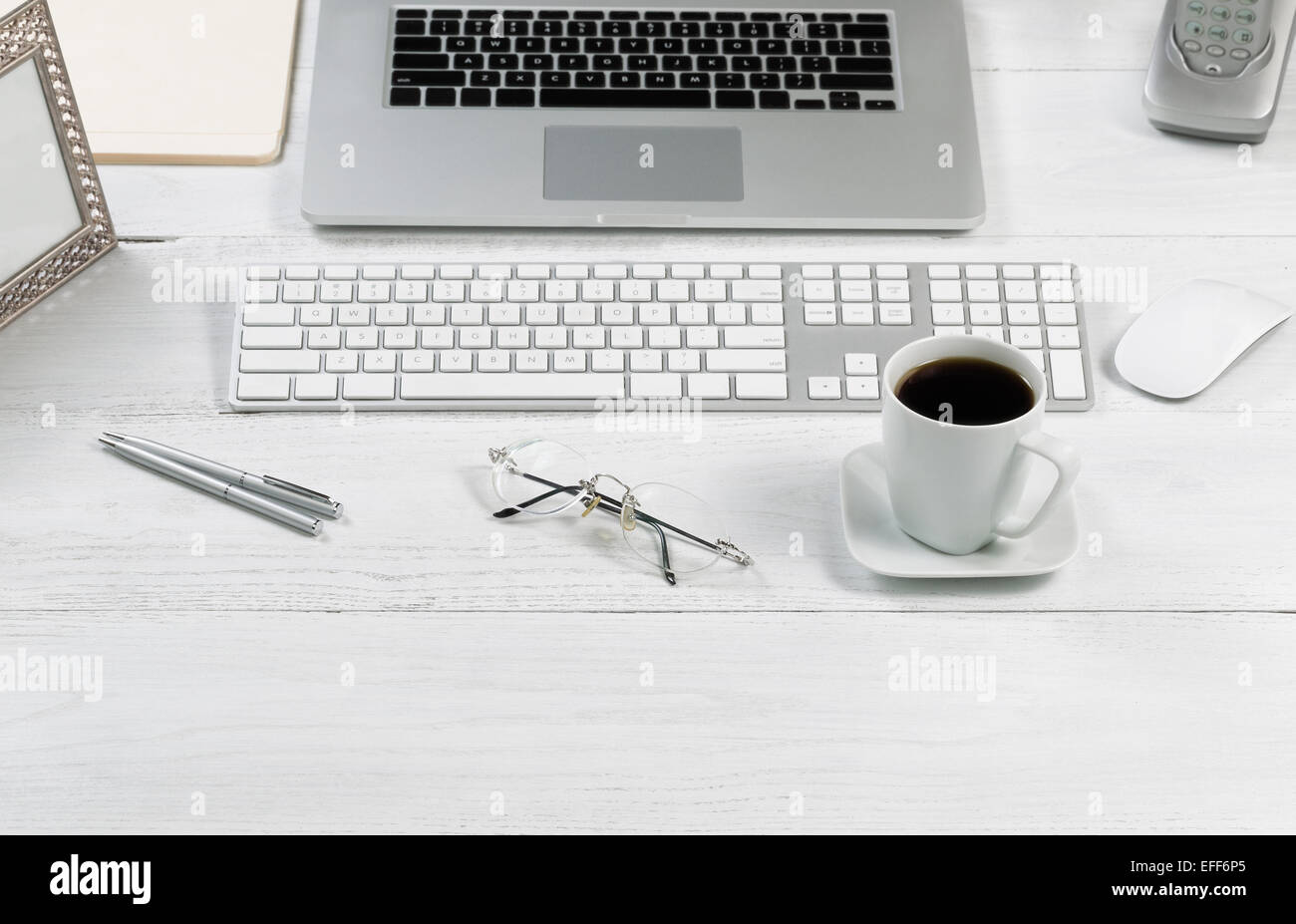 Front view angle of desktop layout for proper use consisting of laptop ...