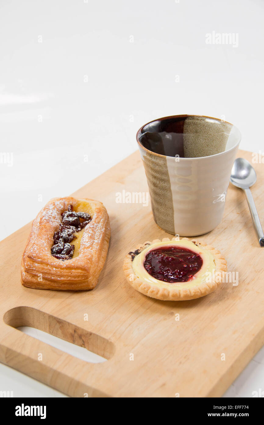 A Cup of coffee and danish pastry Stock Photo - Alamy