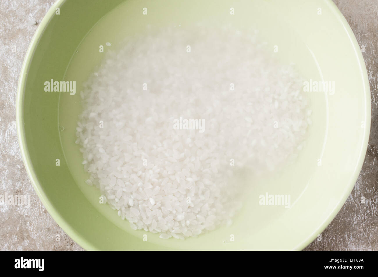 Washing with clean water in the rice bowl of green Stock Photo - Alamy