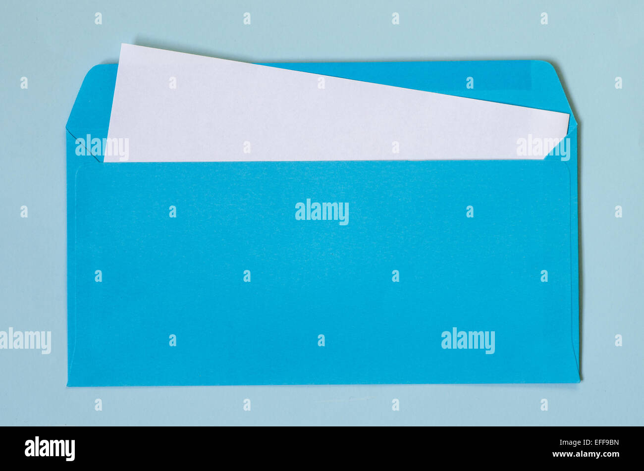 open blue envelope with blank paper on blue background Stock Photo - Alamy