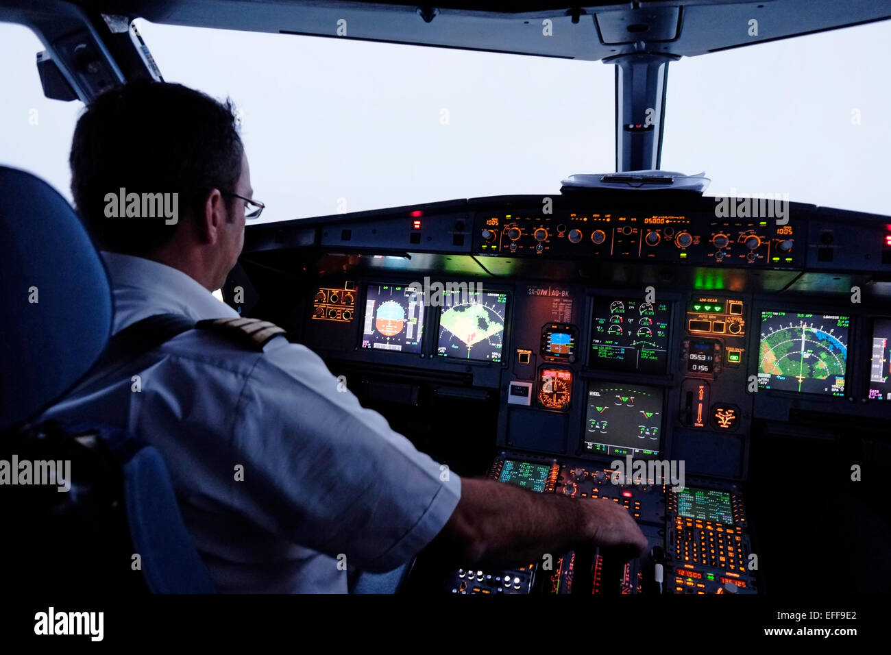 Pilot of Aegean Greek airline in the cockpit of an Airbus A380 aircraft ...