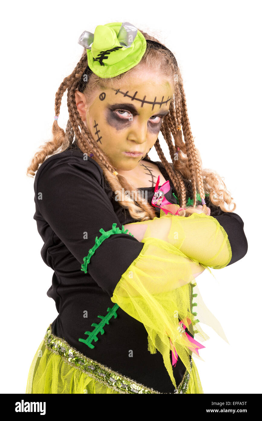 Girl with face-paint and Halloween monster costume isolated in white ...
