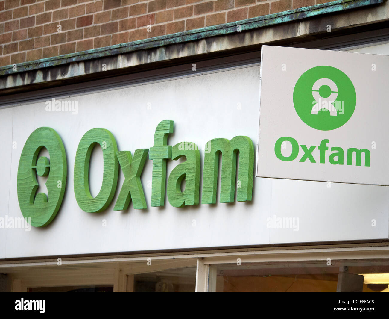 Oxfam sign on outside wall UK Stock Photo - Alamy