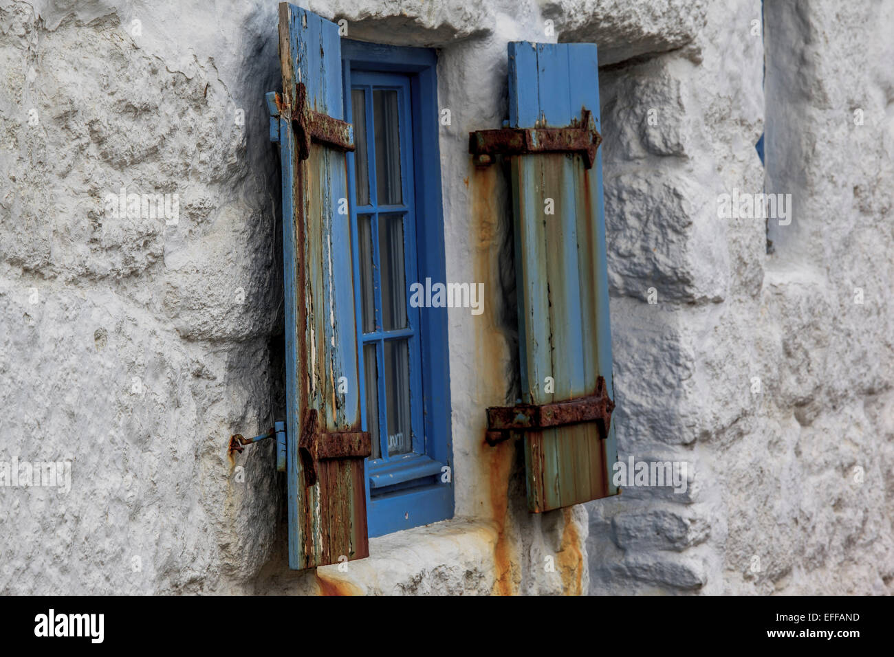 Shuttered blue window hi-res stock photography and images - Alamy