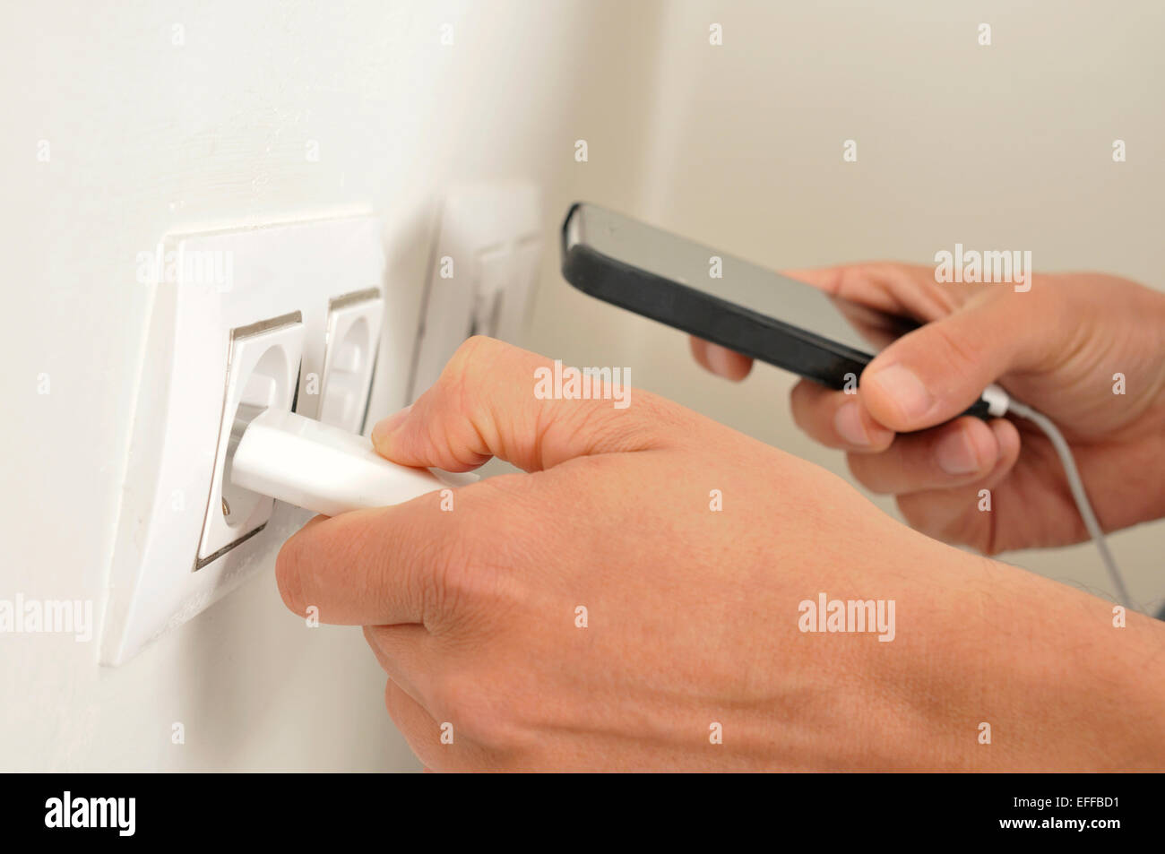 Plugging In A Me Plug High Resolution Stock Photography and Images - Alamy