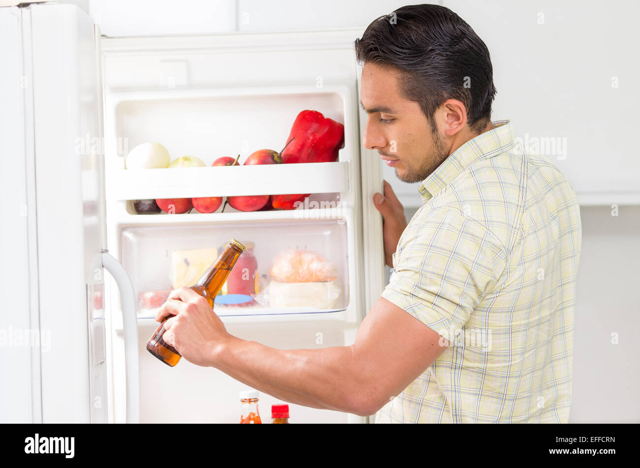 Handsome husband helping happy hi-res stock photography and images - Alamy