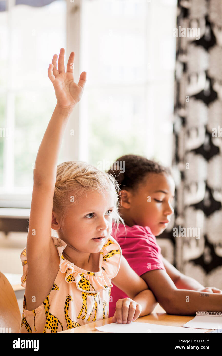 Raising hand classroom hi-res stock photography and images - Alamy