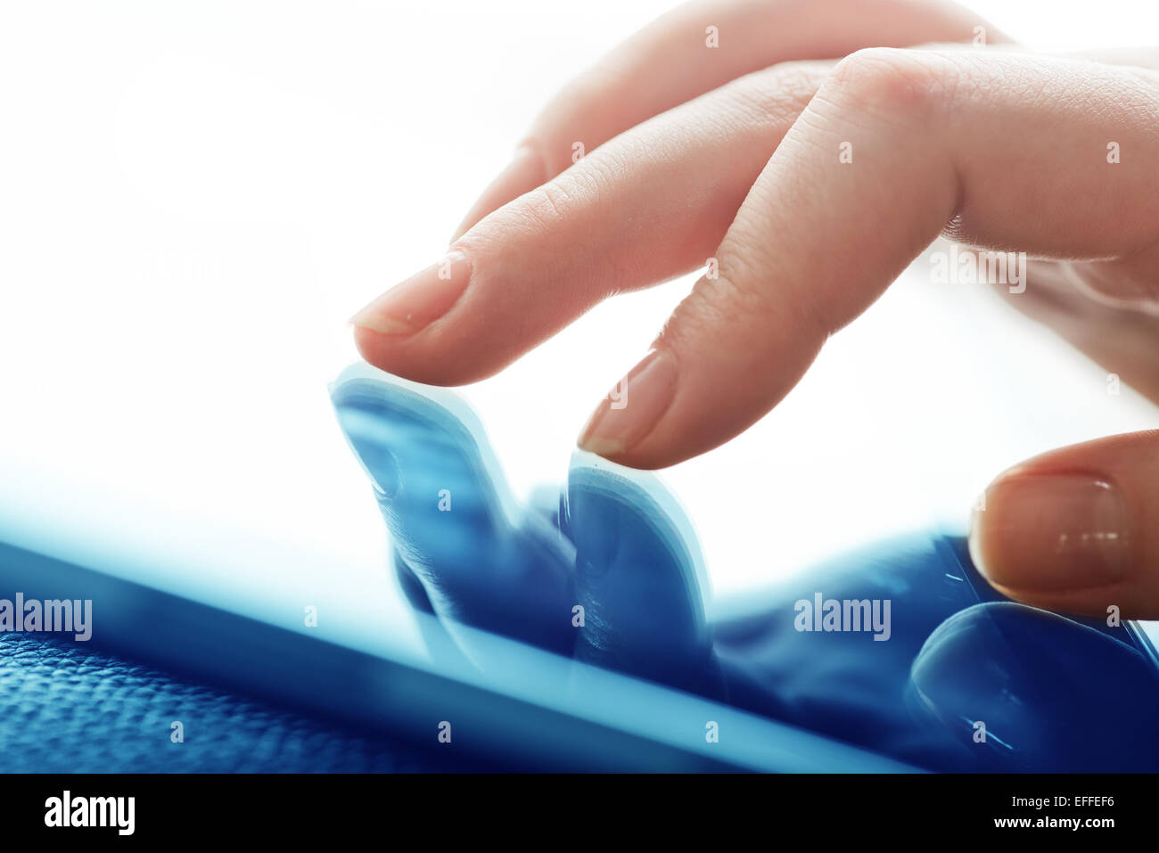 closeup of finger touching screen on tablet-pc Stock Photo - Alamy